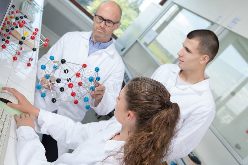 Apprentices at Physics Class Stock Image - Image of looking ...