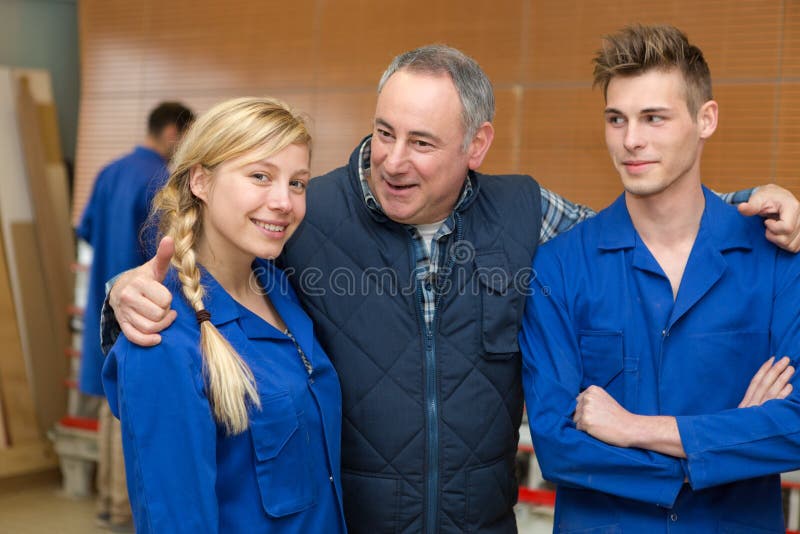 Apprenticeship Teacher Happy with Students Stock Image - Image of ...