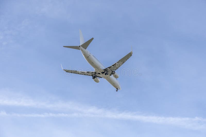 The Approach of a Jet Plane Flying at Low Altitude Stock Image - Image ...