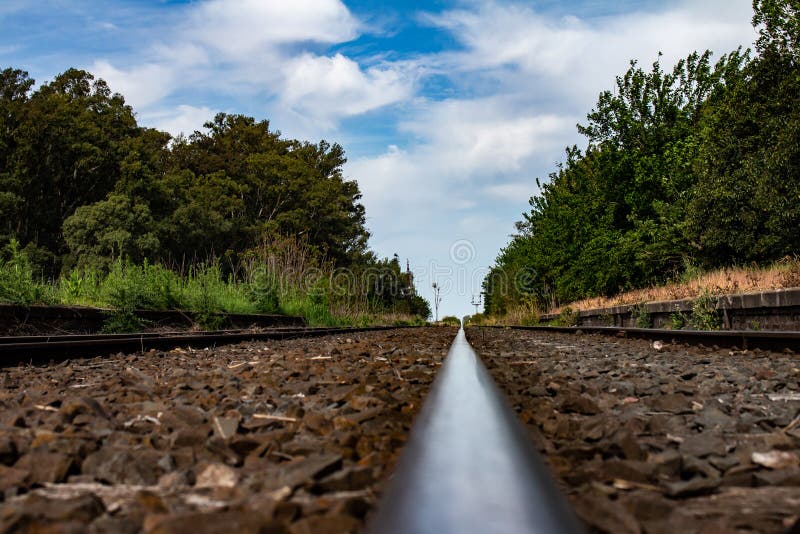 Approach of a Train Track that is Lost in Infinity. Stock Photo - Image ...