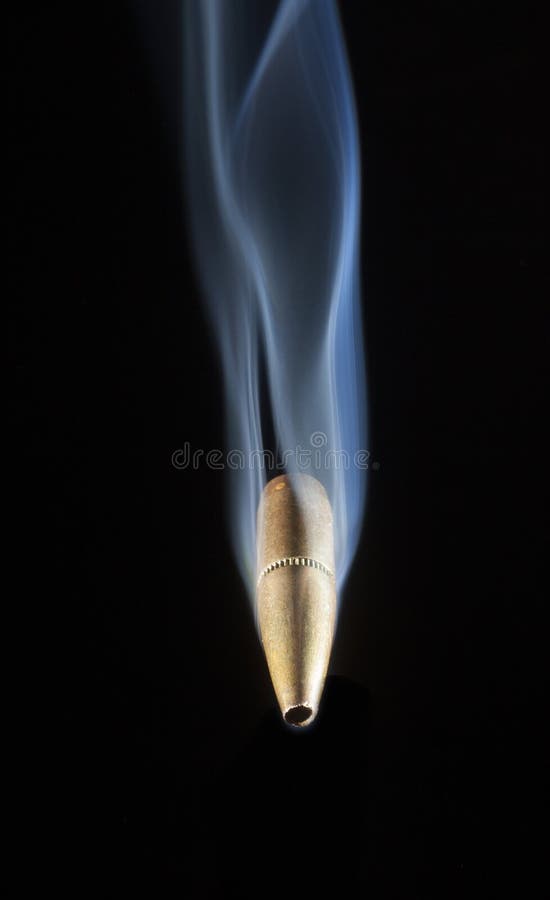 Approaching bullet stock image. Image of fast, smoke - 67720587
