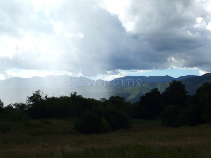 Rainstorm on Mountain and Lake in Rainforest at National Park Stock ...