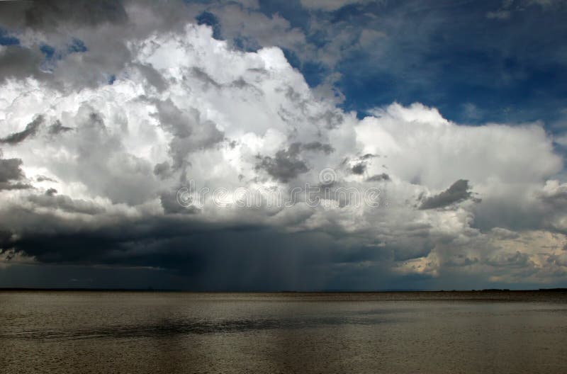 Approaching Storm Clouds Over Water Stock Image - Image of rainstorm ...