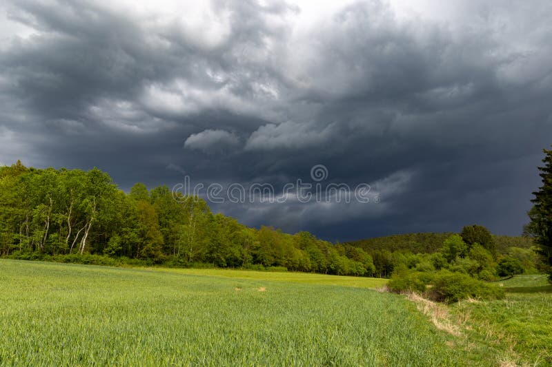 An Approaching Storm. Summer Landscape with Thunderclouds Stock Image ...