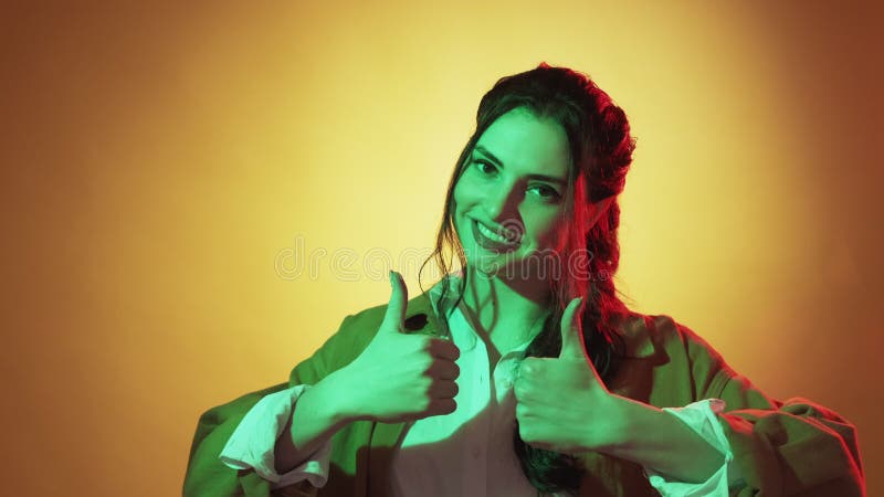 Approving Woman Like Gesture Neon Light Thumbs Up Stock Video - Video ... Approving Woman Like Gesture Neon Light Thumbs Up Stock Video - Video ...