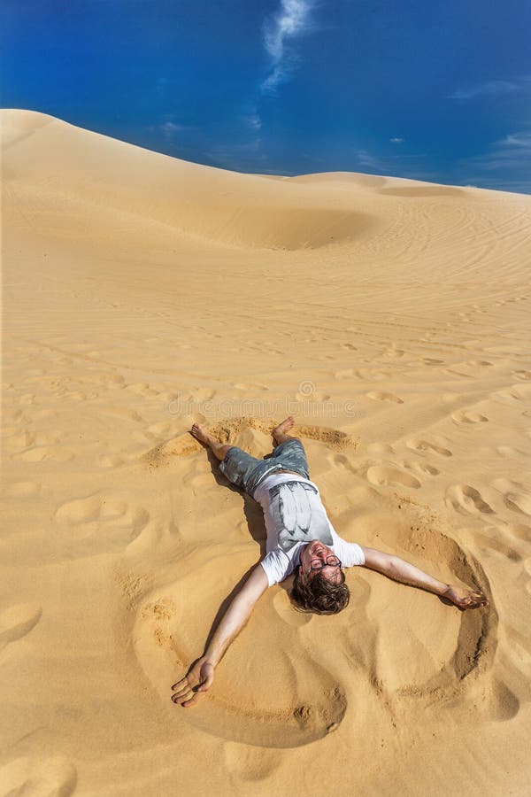 Boy Beach Making Sand Angel Stock Photos - Free & Royalty-Free Stock ...