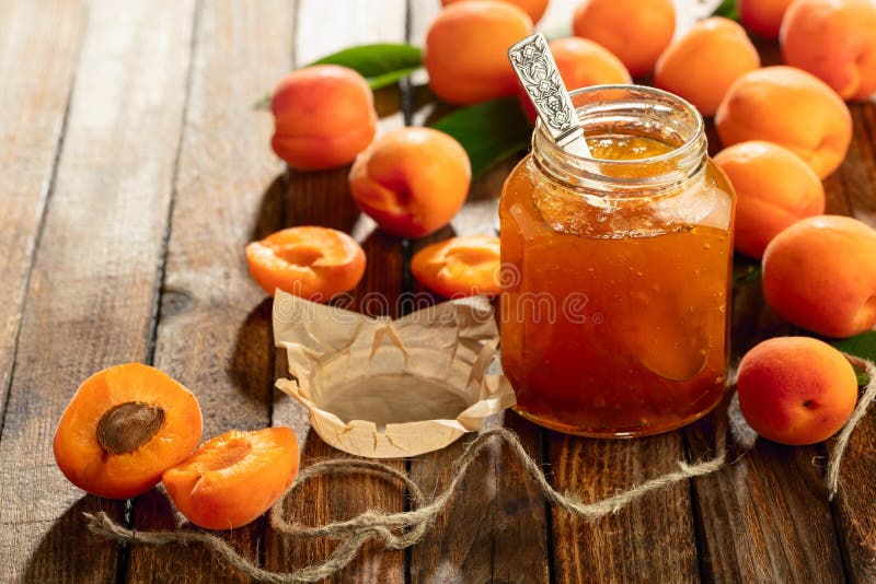 Apricot Jam and Fresh Fruit on an Old Wooden Table Stock Photo - Image ...