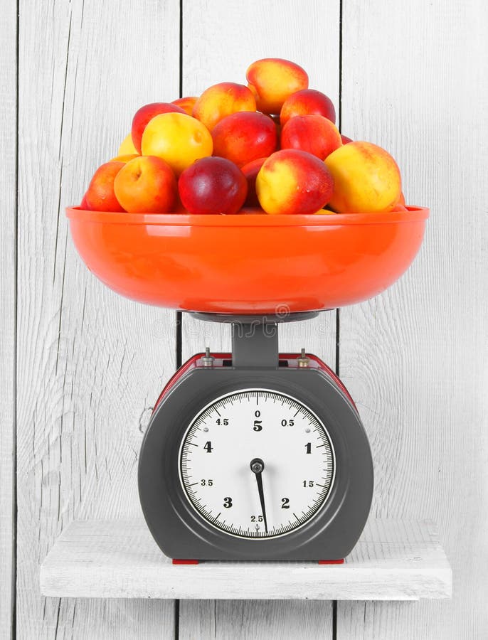 Apricots on scales stock image. Image of peach, shop - 44676753
