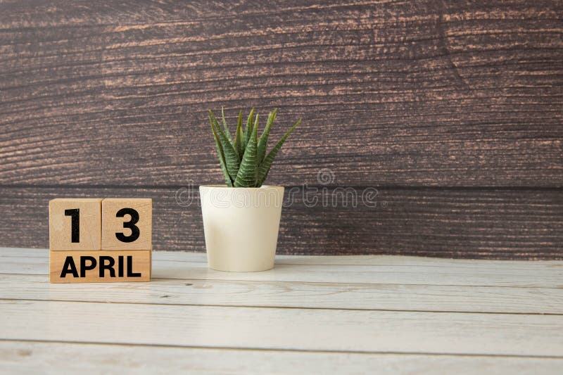 April Calendar and Toy Home. Day 13 of Month Stock Photo - Image of ...