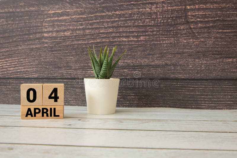 4 April Calendar on Wooden Table with Customizable Space for Text Stock ...