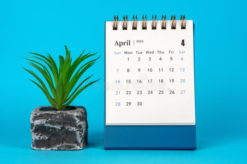 April 2024 Desk Calendar on Blue Background Stock Image - Image of copy ...