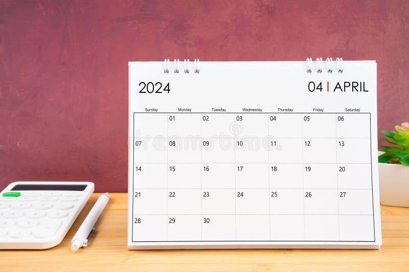 April 2024 White Calendar and Calculator with Pen Stock Photo - Image ...