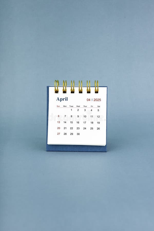 April 2025 White Desk Calendar on Blue Background Stock Image - Image ...