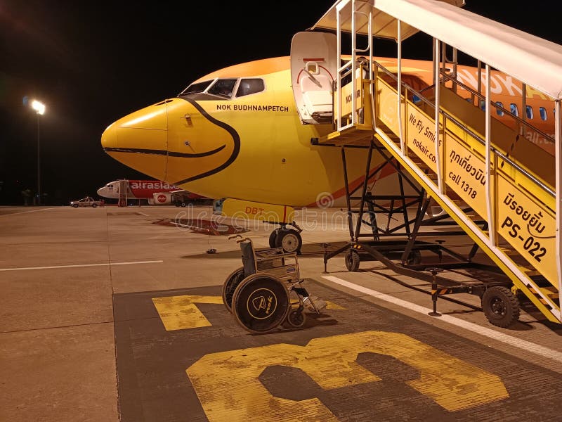 In the Apron. the Yellow Plane in the Airport is Preparing for Takeoff ...