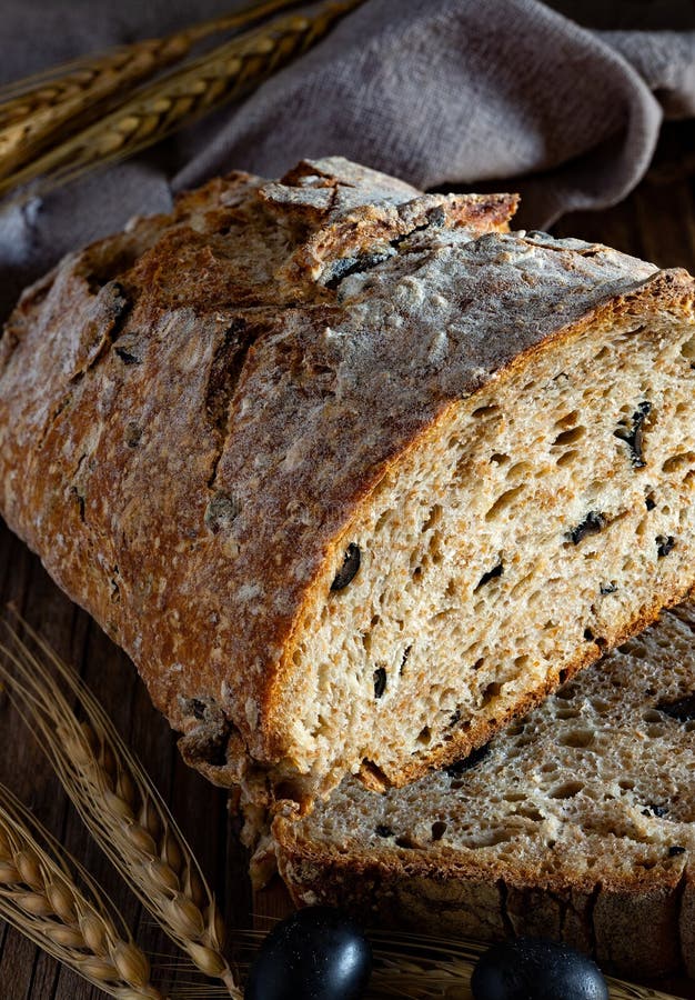 Apulian Bread with Wholemeal Flour and Black Olives Stock Image - Image ...