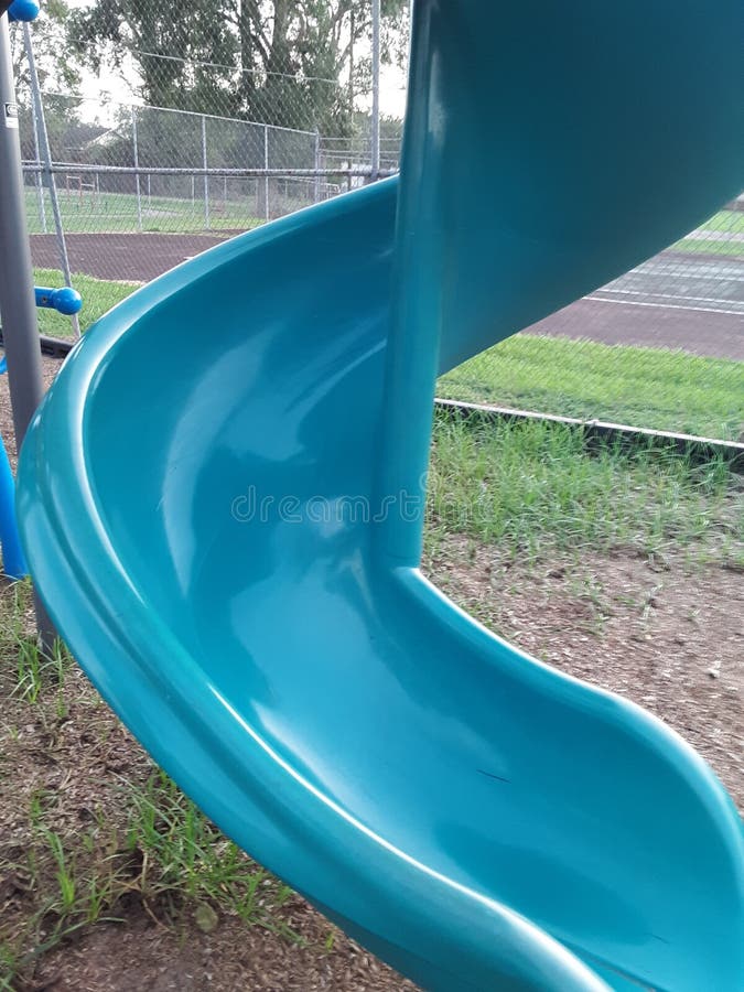 Blue slide in the park stock photo. Image of childhood - 32845936
