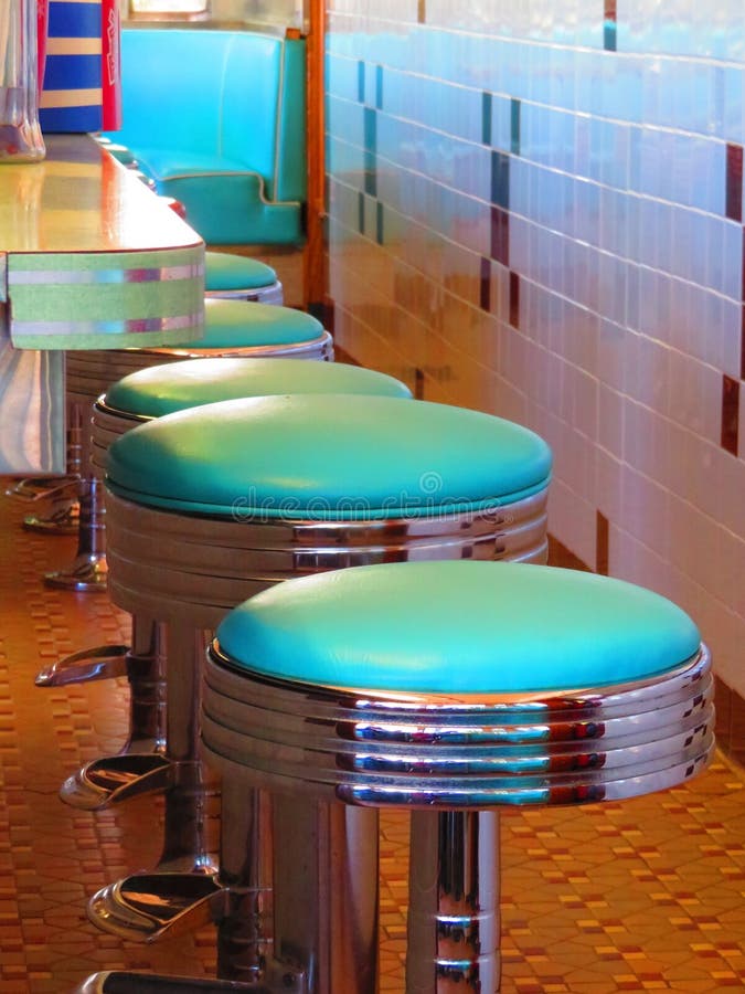 Aqua and Chrome Diner Counter Stools in Row Stock Photo - Image of ...