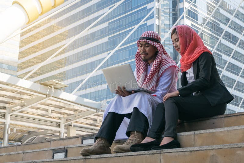 Arab Businessman and Businesswoman Using Computer Stock Photo - Image ...