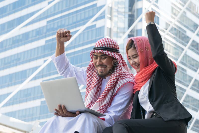 Arab Businessman and Businesswoman Using Computer Stock Photo - Image ...