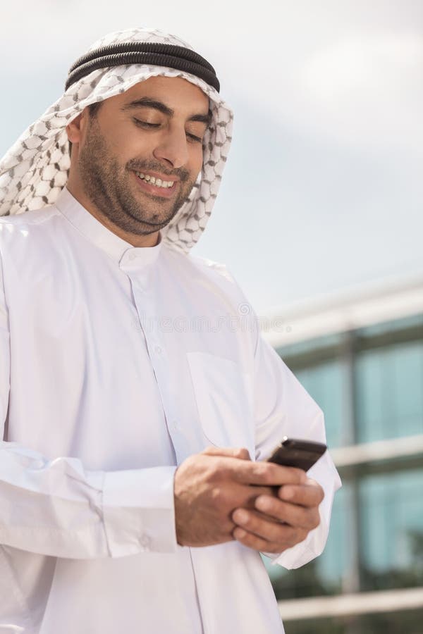 Arab Saudi Man Watching Social Media in the Smart Phone Stock Image ...