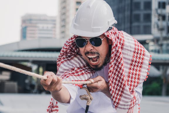 Arab Businessman Pull the Rope Stock Photo - Image of suit, team: 101484320
