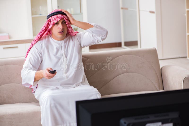 The Arab Businessman Watching Tv at Home Stock Photo - Image of arabic ...