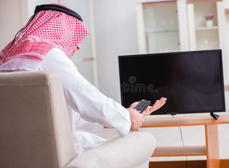 Arab Businessman Watching Tv at Home Stock Photo - Image of movie ...