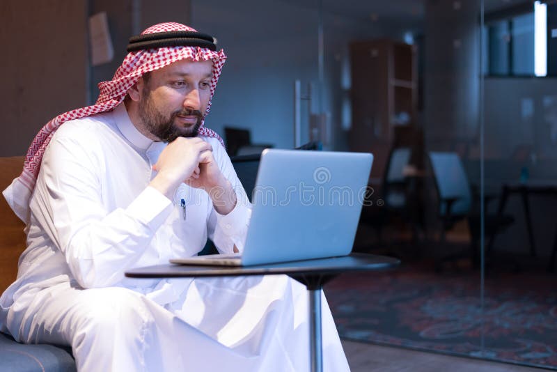 Arab Businessman Worker Works in Computer on the Workplace in the ...