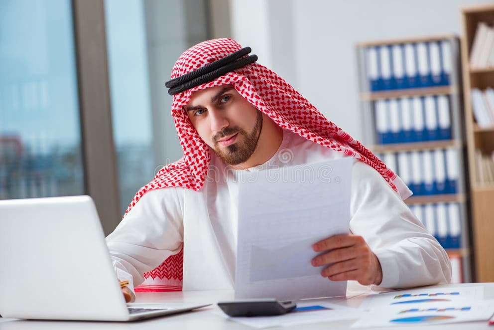 The Arab Businessman Working on Laptop Computer Stock Photo - Image of ...