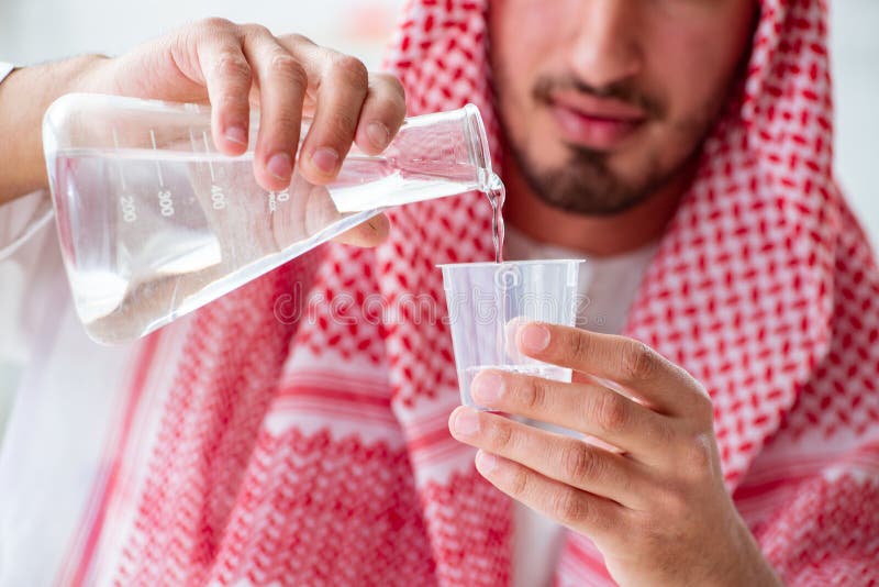 The Arab Chemist Checking the Quality of Drinking Water Stock Image ...