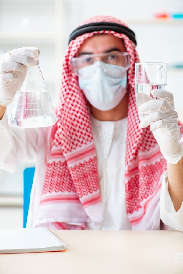 The Arab Chemist Checking the Quality of Drinking Water Stock Photo ...