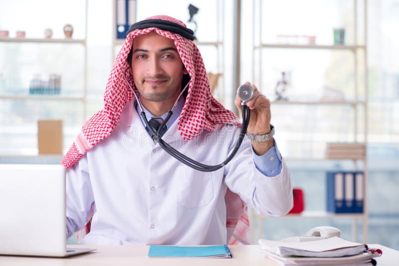 The Arab Doctor Cardiologist Working in the Clinic Stock Photo - Image ...