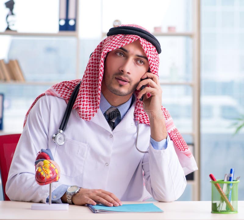 The Arab Doctor Cardiologist Working in the Clinic Stock Image - Image ...