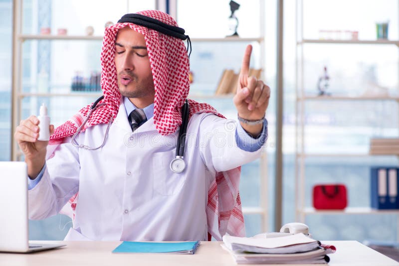 The Arab Doctor Working in the Clinic Stock Photo - Image of doctor ...