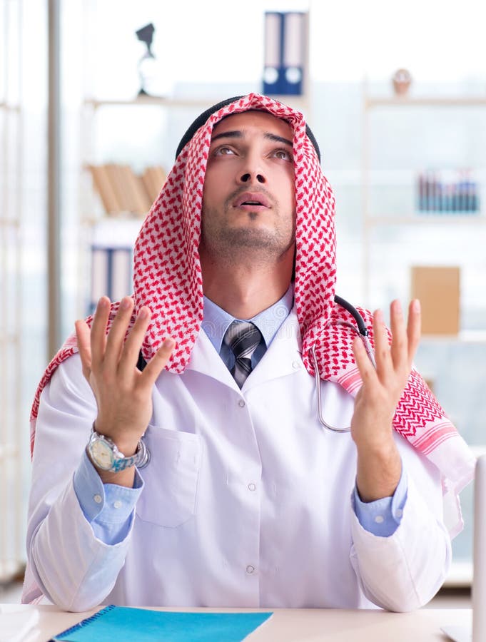 The Arab Doctor Working in the Clinic Stock Image - Image of ...