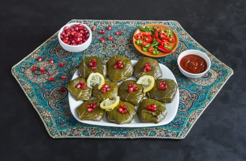Dolma, Stuffed Grape Leaves With Rice, Meat And Pomegranate Stock Image ...