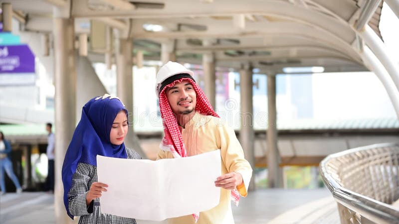 Arab Engineer Consult Construction Project Together Hold Blueprint ...