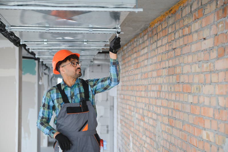 Arab Engineer Working on Ventilation System at Construction Site Stock ...