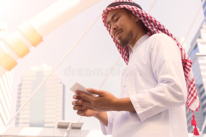 Arab Entrepreneur Use Mobile Phone. Stock Photo - Image of emirates ...