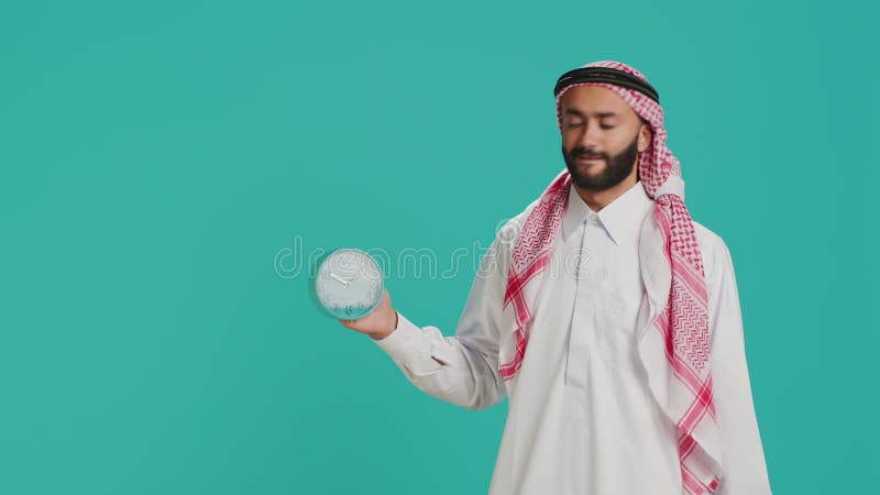 Arab Guy Sees Wall Clock To Check Time Stock Video - Video of print ...