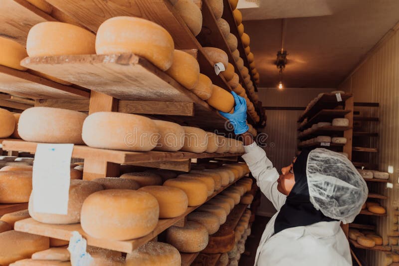 Arab Investor in a Warehouse of the Cheese Production Industry Stock ...