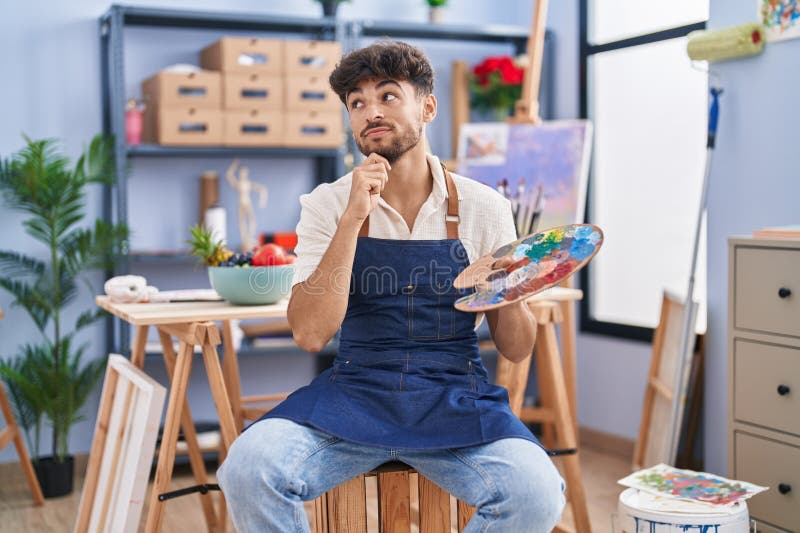 Arab Man with Beard Painter Sitting at Art Studio Holding Palette ...