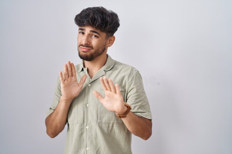 Arab Man with Beard Standing Over White Background Moving Away Hands ...