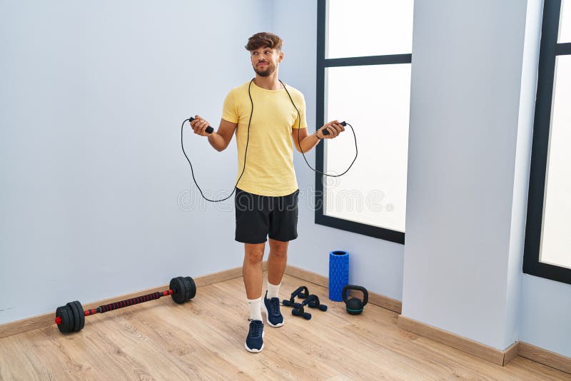 Arab Man with Beard Training with Jump Rope Smiling Looking To the Side ...