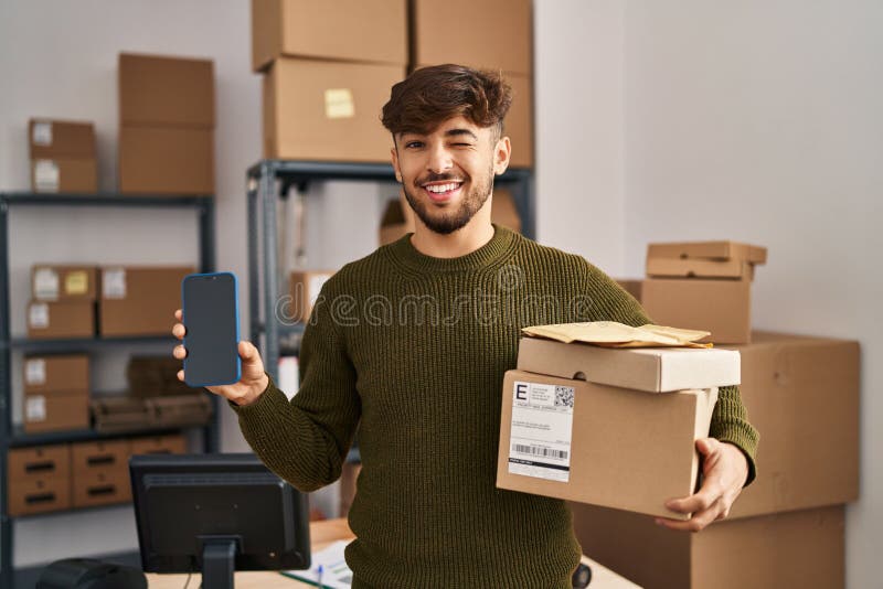 Arab Man with Beard Working at Small Business Ecommerce Holding ...
