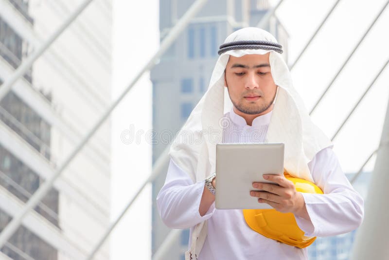 Arab Man Construction Civil Engineer at Building Construction Site ...