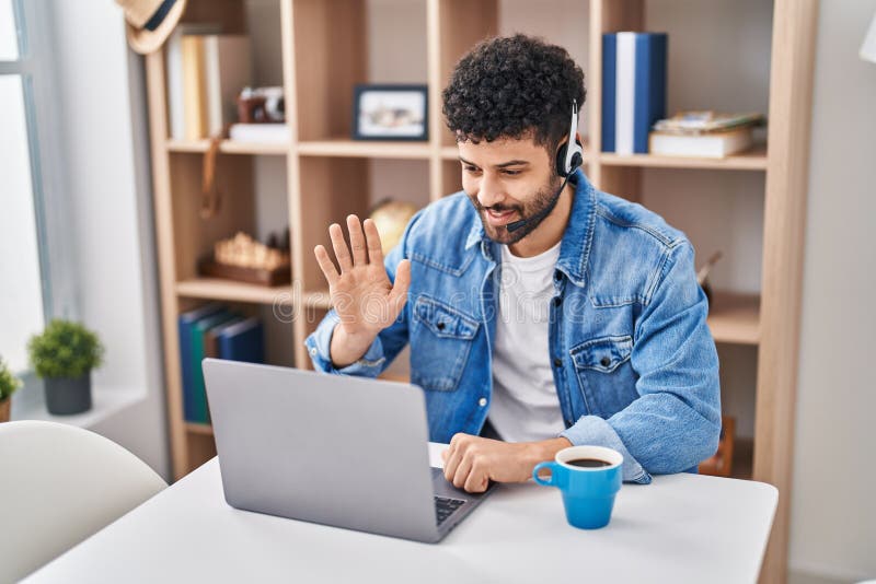 Arab Man Doing Video Call Using Computer Laptop Looking Positive and ...