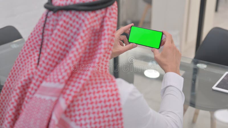 Arab Man Holding Phone with Green Screen Stock Image - Image of ...