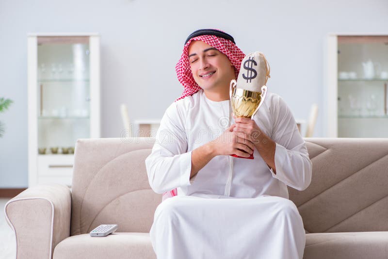 The Arab Man with Prize and Money on Sofa Stock Image - Image of ...