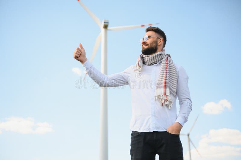 Arab Man Standing with Wind Turbine on Mountain Stock Image - Image of ...